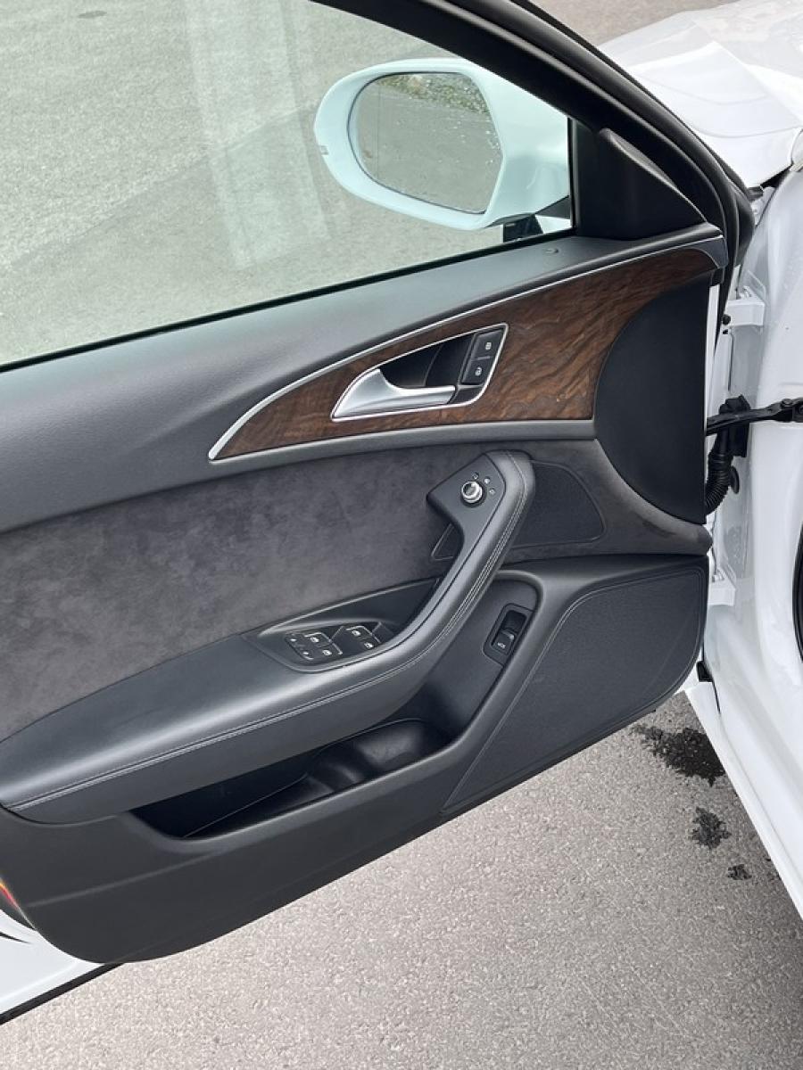White Audi A6 2013 in Maardu, with an engine capacity of 3.00 L and mileage of 217 thousand km for 13700 €, photo 14 on AUTOMOTO.COM.LV