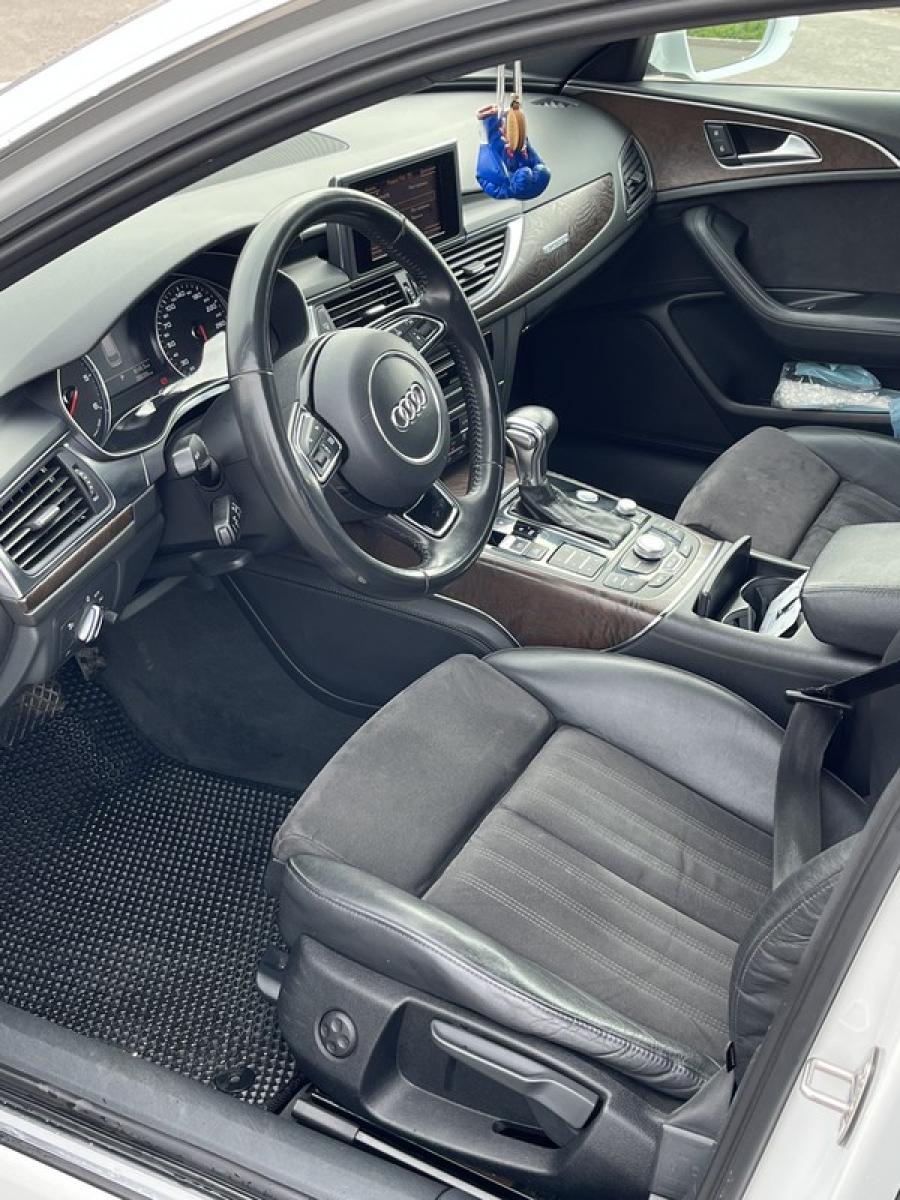White Audi A6 2013 in Maardu, with an engine capacity of 3.00 L and mileage of 217 thousand km for 13700 €, photo 15 on AUTOMOTO.COM.LV