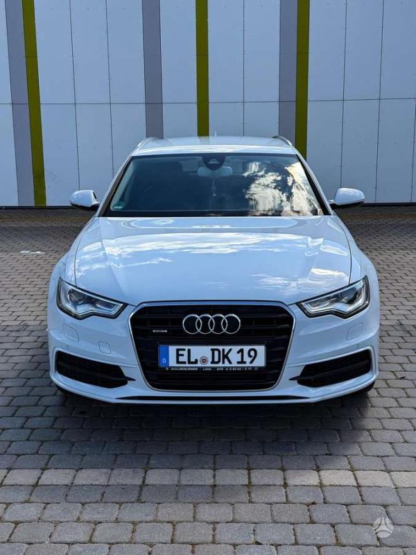White Audi A6 2013 in Raseiniai, with an engine capacity of 2.97 L and mileage of 262 thousand km for 11700 €, photo 4 on AUTOMOTO.COM.LV