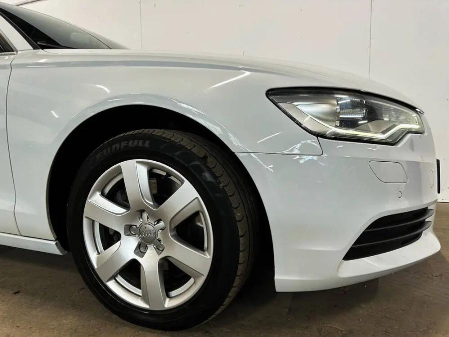 White Audi A6 2013 in Jurmala, with an engine capacity of 3.00 L and mileage of 250 thousand km for 8950 €, photo 24 on AUTOMOTO.COM.LV