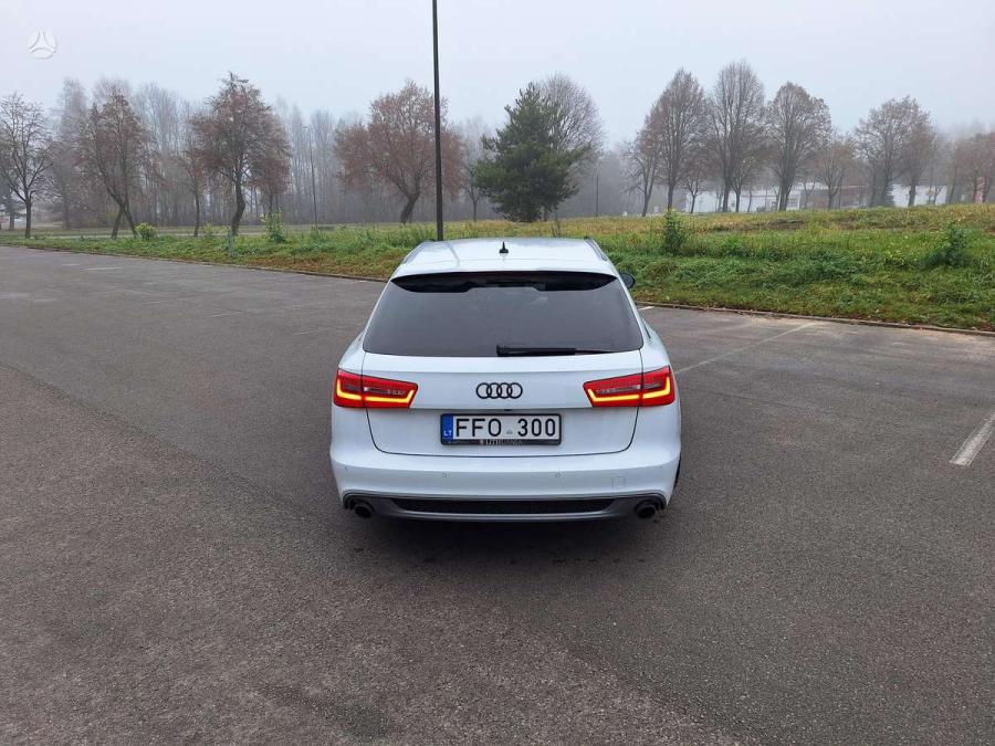 White Audi A6 2013 in Kaunas, with an engine capacity of 2.97 L and mileage of 330 thousand km for 11700 €, photo 4 on AUTOMOTO.COM.LV