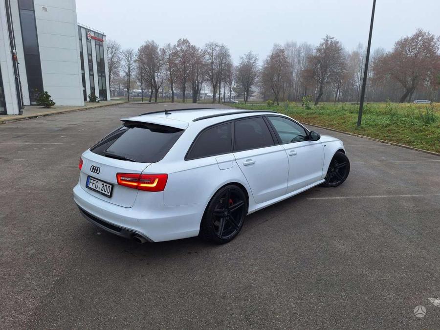 White Audi A6 2013 in Kaunas, with an engine capacity of 2.97 L and mileage of 330 thousand km for 11700 €, photo 5 on AUTOMOTO.COM.LV
