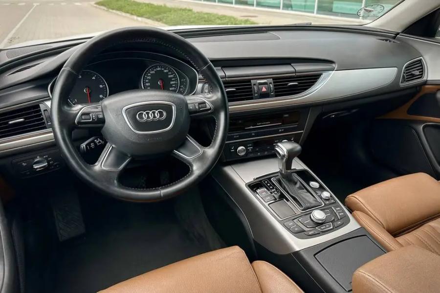 White Audi A6 2013 in Rezekne, with an engine capacity of 3.00 L and mileage of 239 thousand km for 8990 €, photo 12 on AUTOMOTO.COM.LV