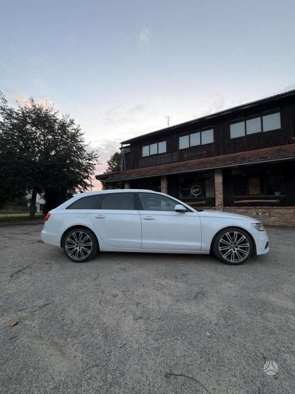 White Audi A6 2013 in Kaunas, with an engine capacity of 2.97 L and mileage of 320 thousand km for 8900 €, photo 6 on AUTOMOTO.COM.LV