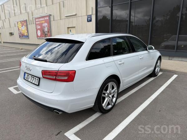 White Audi A6 2013 in Riga, with an engine capacity of 3.00 L and mileage of 438 thousand km for 6900 €, photo 6 on AUTOMOTO.COM.LV