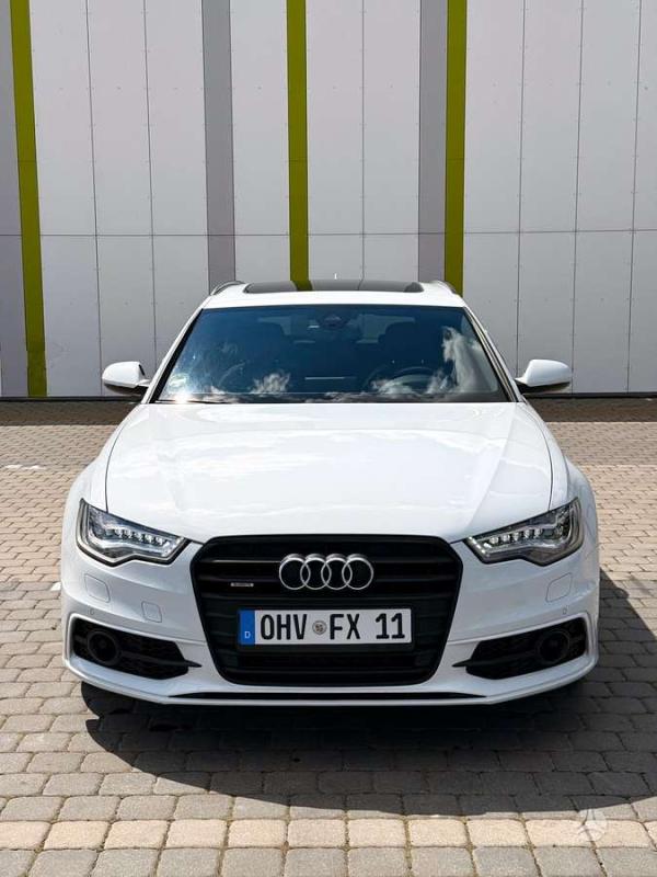 White Audi A6 2014 in Raseiniai, with an engine capacity of 2.97 L and mileage of 251 thousand km for 13700 €, photo 4 on AUTOMOTO.COM.LV