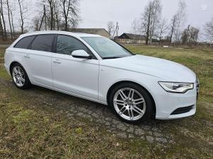 White Audi A6 2014 in Marijampole, with an engine capacity of 1.97 L and mileage of 312 thousand km for 8999 €, photo 4 on AUTOMOTO.COM.LV