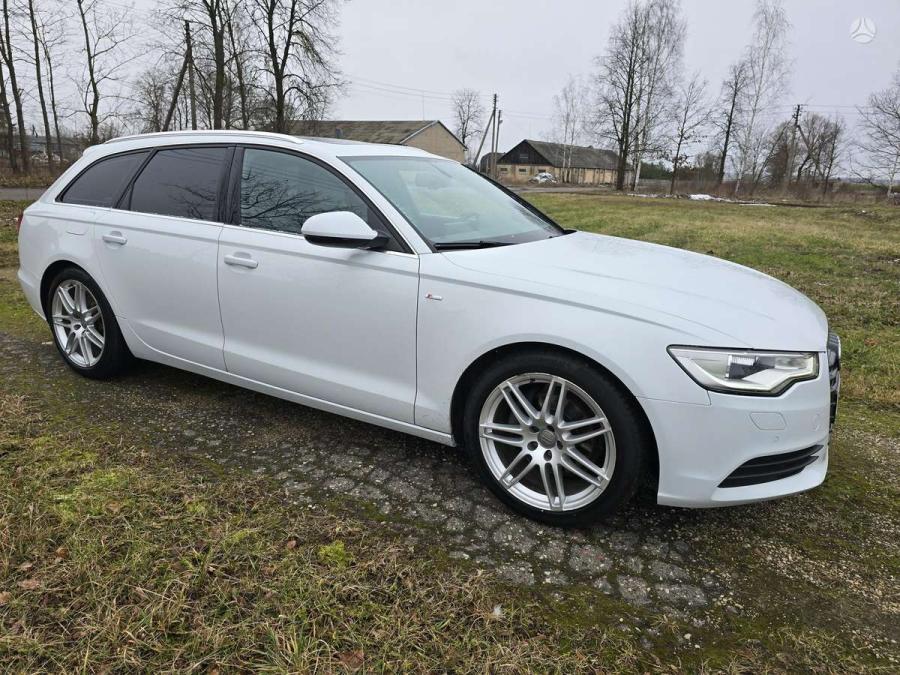 White Audi A6 2014 in Marijampole, with an engine capacity of 1.97 L and mileage of 312 thousand km for 8999 €, photo 4 on AUTOMOTO.COM.LV