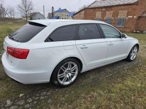 White Audi A6 2014 in Marijampole, with an engine capacity of 1.97 L and mileage of 312 thousand km for 8999 €, photo 5 on AUTOMOTO.COM.LV