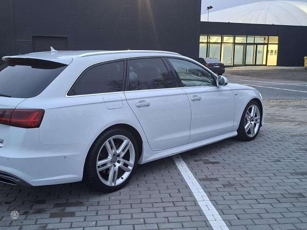 White Audi A6 2015 in Kaunas, with an engine capacity of 2.97 L and mileage of 256 thousand km for 17800 €, photo 9 on AUTOMOTO.COM.LV