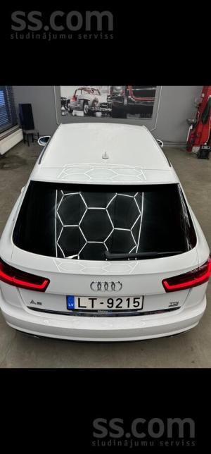 White Audi A6 2015 in Riga, with an engine capacity of 2.00 L and mileage of 243 thousand km for 11387 €, photo 4 on AUTOMOTO.COM.LV