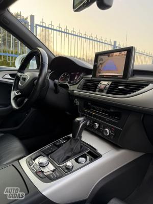 White Audi A6 2015 in Vilnius, with an engine capacity of 3.00 L and mileage of 342 thousand km for 15500 €, photo 13 on AUTOMOTO.COM.LV