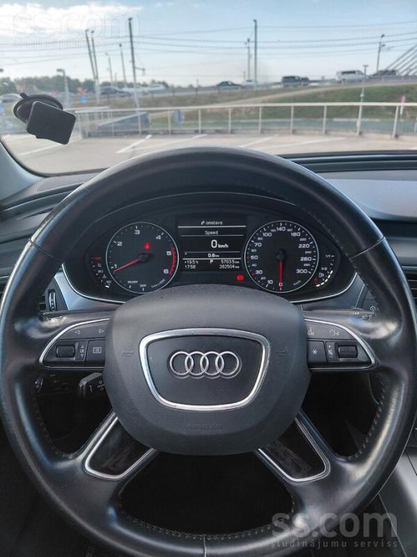 White Audi A6 2016 in Riga, with an engine capacity of 2.00 L and mileage of 283 thousand km for 13990 €, photo 8 on AUTOMOTO.COM.LV