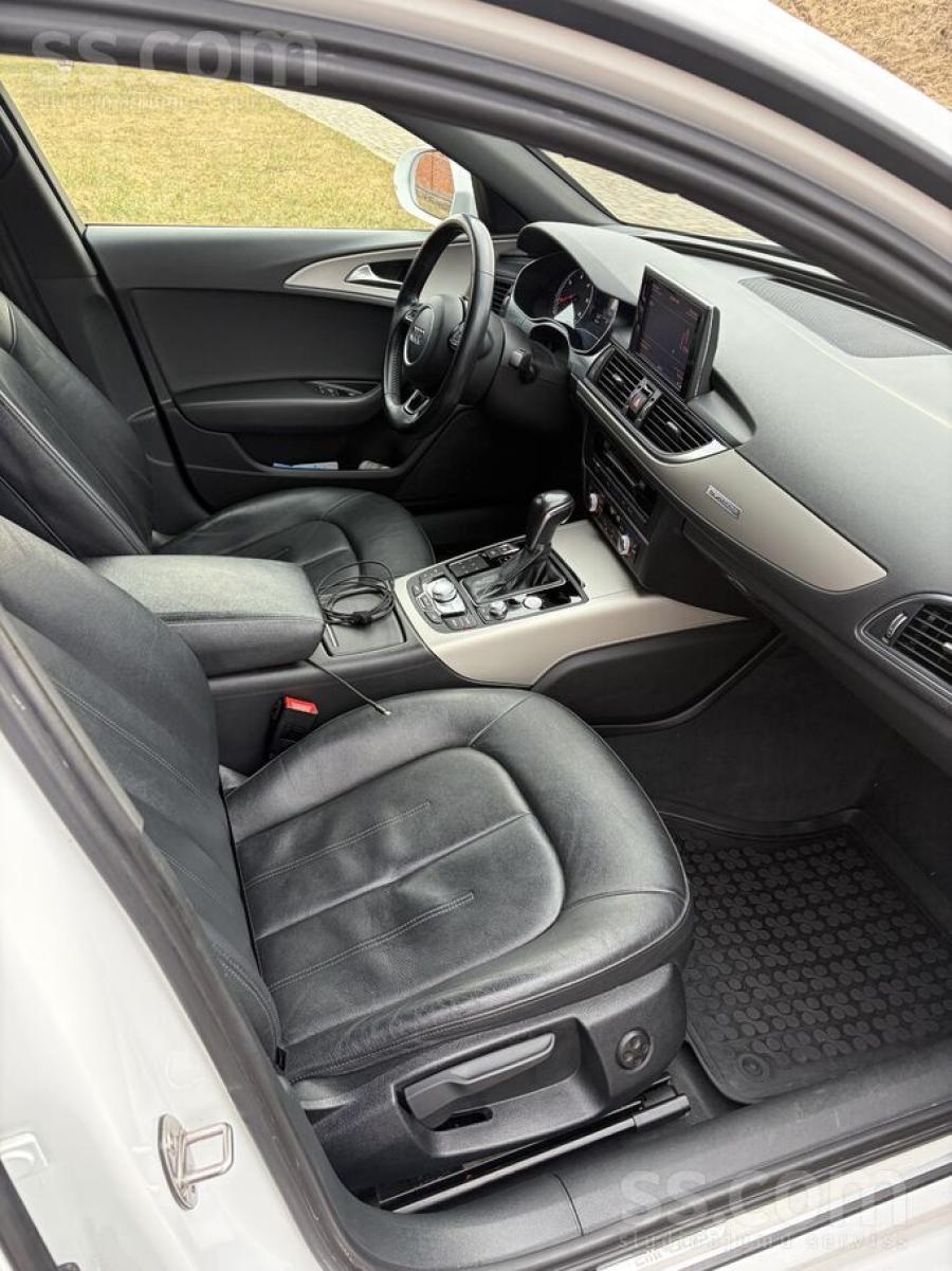 White Audi A6 2017 in Daugavpils, with an engine capacity of 3.00 L and mileage of 224 thousand km for 16990 €, photo 9 on AUTOMOTO.COM.LV