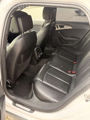 White Audi A6 2017 in Daugavpils, with an engine capacity of 3.00 L and mileage of 224 thousand km for 16990 €, photo 12 on AUTOMOTO.COM.LV