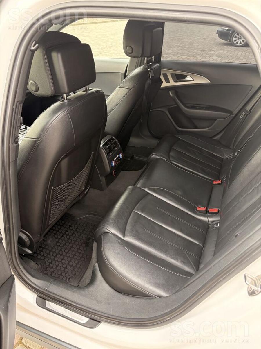White Audi A6 2017 in Daugavpils, with an engine capacity of 3.00 L and mileage of 224 thousand km for 16990 €, photo 12 on AUTOMOTO.COM.LV