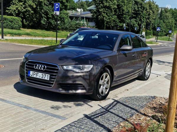 Yellow Audi A6 2011 in Vilnius, with an engine capacity of 2.97 L and mileage of 297 thousand km for 8800 €, photo 2 on AUTOMOTO.COM.LV