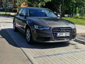 Yellow Audi A6 2011 in Vilnius, with an engine capacity of 2.97 L and mileage of 297 thousand km for 8800 €, photo 4 on AUTOMOTO.COM.LV