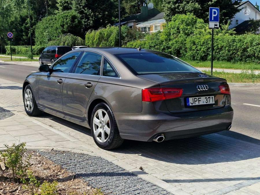 Yellow Audi A6 2011 in Vilnius, with an engine capacity of 2.97 L and mileage of 297 thousand km for 8800 €, photo 6 on AUTOMOTO.COM.LV