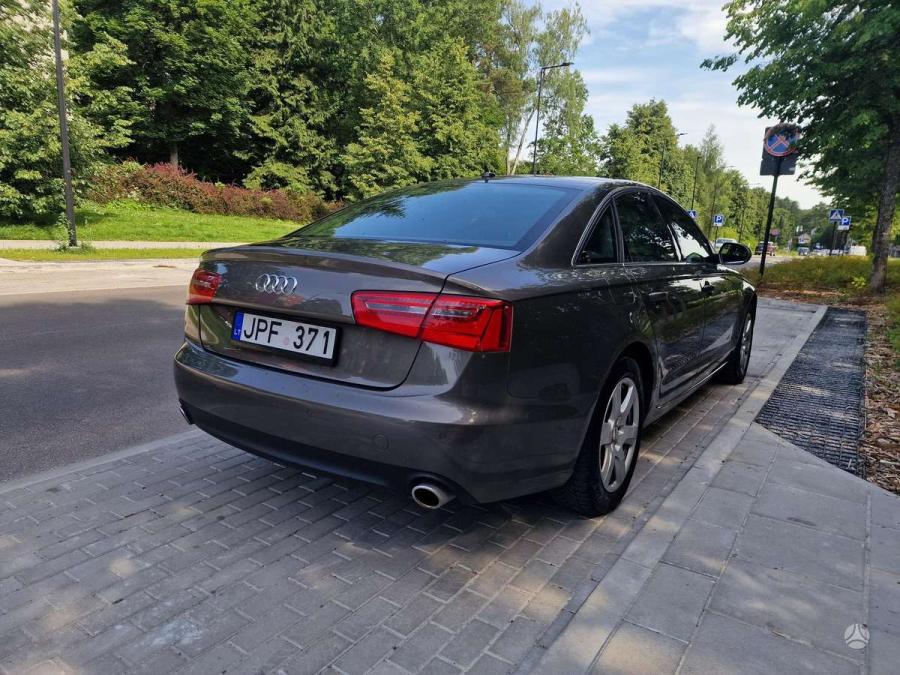 Yellow Audi A6 2011 in Vilnius, with an engine capacity of 2.97 L and mileage of 297 thousand km for 8800 €, photo 8 on AUTOMOTO.COM.LV