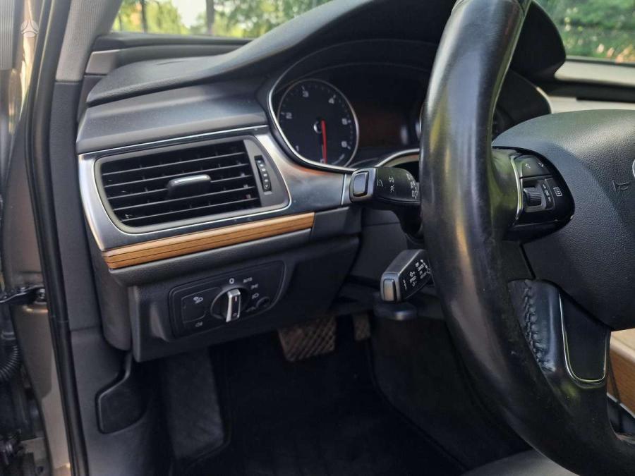 Yellow Audi A6 2011 in Vilnius, with an engine capacity of 2.97 L and mileage of 297 thousand km for 8800 €, photo 14 on AUTOMOTO.COM.LV