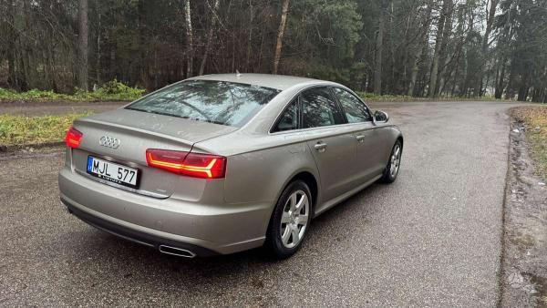 Yellow Audi A6 2015 in Vilnius, with an engine capacity of 2.00 L and mileage of 350 thousand km for 13300 €, photo 4 on AUTOMOTO.COM.LV