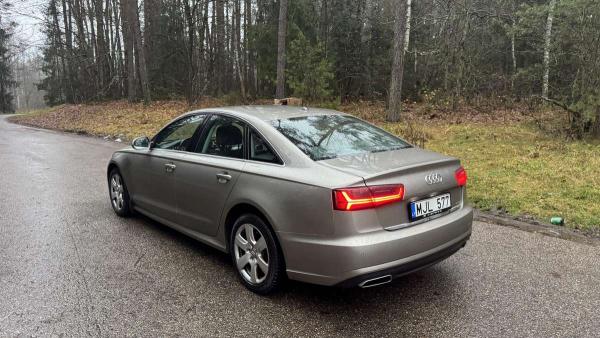 Yellow Audi A6 2015 in Vilnius, with an engine capacity of 2.00 L and mileage of 350 thousand km for 13300 €, photo 5 on AUTOMOTO.COM.LV