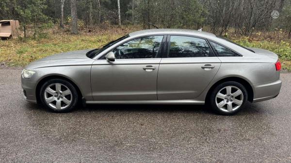 Yellow Audi A6 2015 in Vilnius, with an engine capacity of 2.00 L and mileage of 350 thousand km for 13300 €, photo 7 on AUTOMOTO.COM.LV
