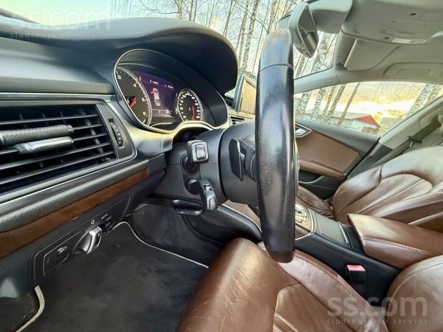 Black Audi A7 Sportback 2011 in Riga, with an engine capacity of 3.00 L and mileage of 0 thousand km for 9550 €, photo 15 on AUTOMOTO.COM.LV