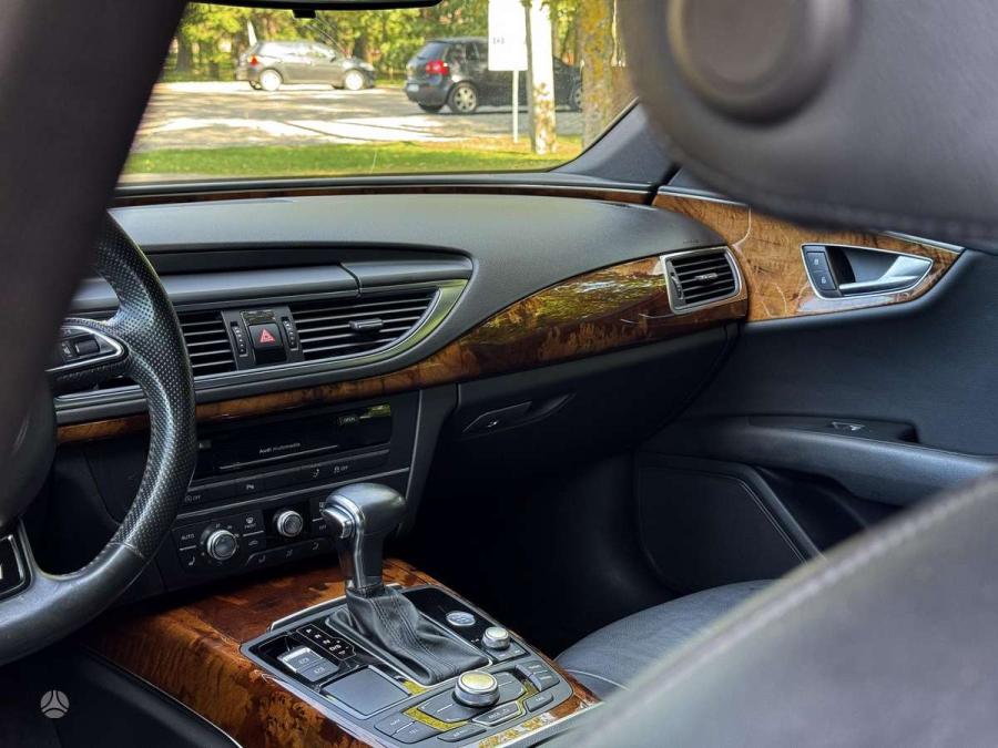 Black Audi A7 Sportback 2011 in Prienai, with an engine capacity of 3.00 L and mileage of 315 thousand km for 13350 €, photo 19 on AUTOMOTO.COM.LV