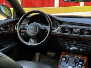 Black Audi A7 Sportback 2011 in Prienai, with an engine capacity of 3.00 L and mileage of 315 thousand km for 13350 €, photo 20 on AUTOMOTO.COM.LV