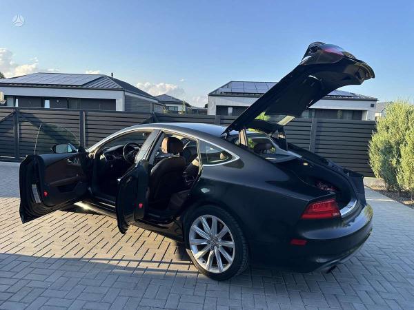 Black Audi A7 Sportback 2012 in Kaunas, with an engine capacity of 3.00 L and mileage of 267 thousand km for 13200 €, photo 3 on AUTOMOTO.COM.LV