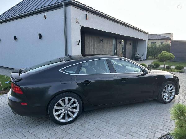 Black Audi A7 Sportback 2012 in Kaunas, with an engine capacity of 3.00 L and mileage of 267 thousand km for 13200 €, photo 6 on AUTOMOTO.COM.LV