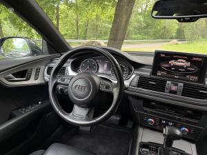 Black Audi A7 Sportback 2011 in Vilnius, with an engine capacity of 3.00 L and mileage of 295 thousand km for 11300 €, photo 20 on AUTOMOTO.COM.LV