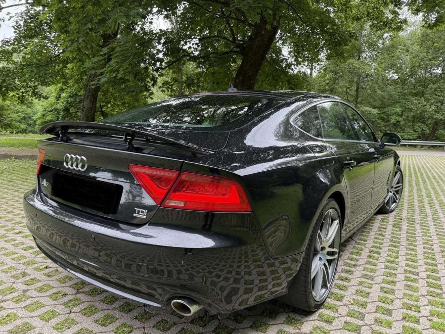 Black Audi A7 Sportback 2011 in Vilnius, with an engine capacity of 2.97 L and mileage of 295 thousand km for 10750 €, photo 33 on AUTOMOTO.COM.LV