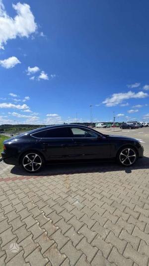 Black Audi A7 Sportback 2012 in Vilnius, with an engine capacity of 2.97 L and mileage of 235 thousand km for 12900 €, photo 4 on AUTOMOTO.COM.LV