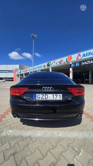 Black Audi A7 Sportback 2012 in Vilnius, with an engine capacity of 2.97 L and mileage of 235 thousand km for 12900 €, photo 6 on AUTOMOTO.COM.LV
