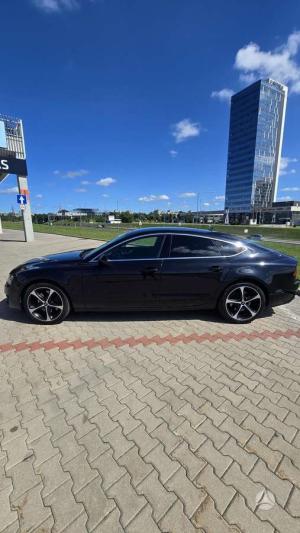 Black Audi A7 Sportback 2012 in Vilnius, with an engine capacity of 2.97 L and mileage of 235 thousand km for 12900 €, photo 8 on AUTOMOTO.COM.LV