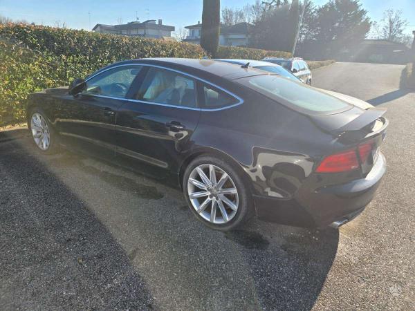 Black Audi A7 Sportback 2013 in Ukmerge, with an engine capacity of 3.00 L and mileage of 222 thousand km for 8300 €, photo 2 on AUTOMOTO.COM.LV