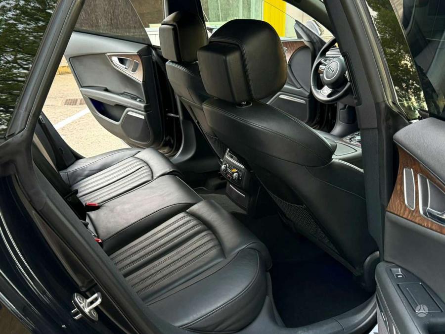 Black Audi A7 Sportback 2013 in Jonava, with an engine capacity of 3.00 L and mileage of 251 thousand km for 15199 €, photo 18 on AUTOMOTO.COM.LV