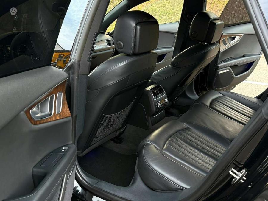 Black Audi A7 Sportback 2013 in Jonava, with an engine capacity of 3.00 L and mileage of 251 thousand km for 15199 €, photo 19 on AUTOMOTO.COM.LV