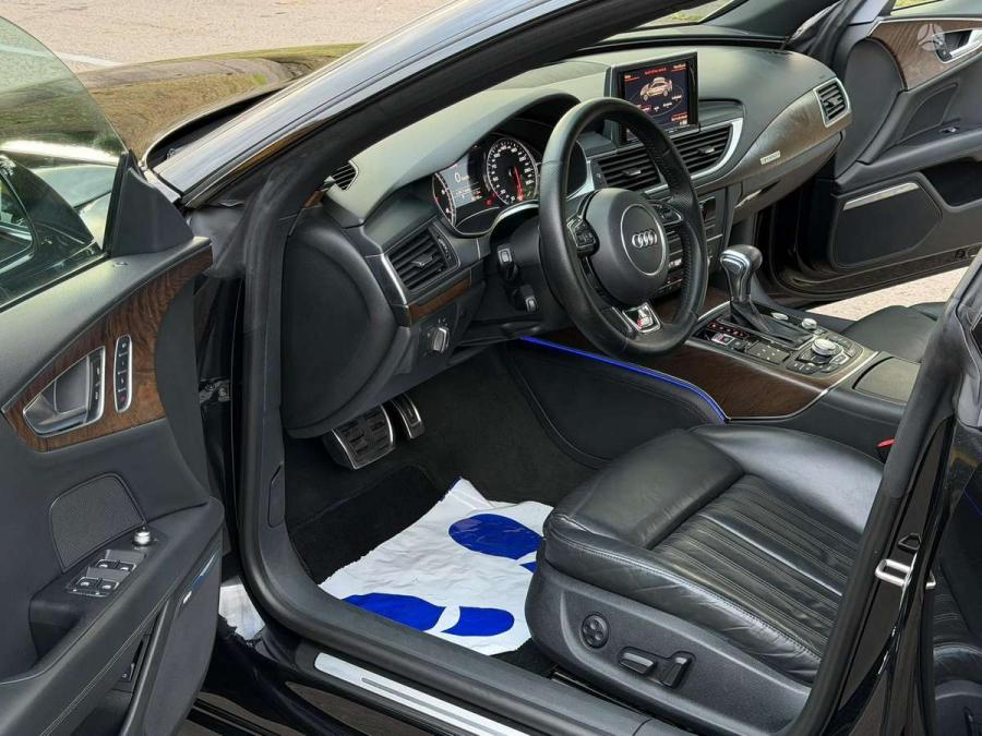 Black Audi A7 Sportback 2013 in Jonava, with an engine capacity of 3.00 L and mileage of 251 thousand km for 15199 €, photo 22 on AUTOMOTO.COM.LV