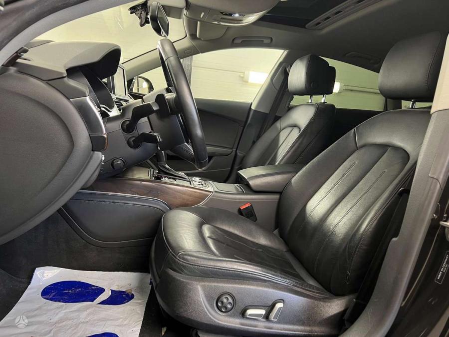 Black Audi A7 Sportback 2015 in Vilnius, with an engine capacity of 3.00 L and mileage of 144 thousand km for 17900 €, photo 15 on AUTOMOTO.COM.LV