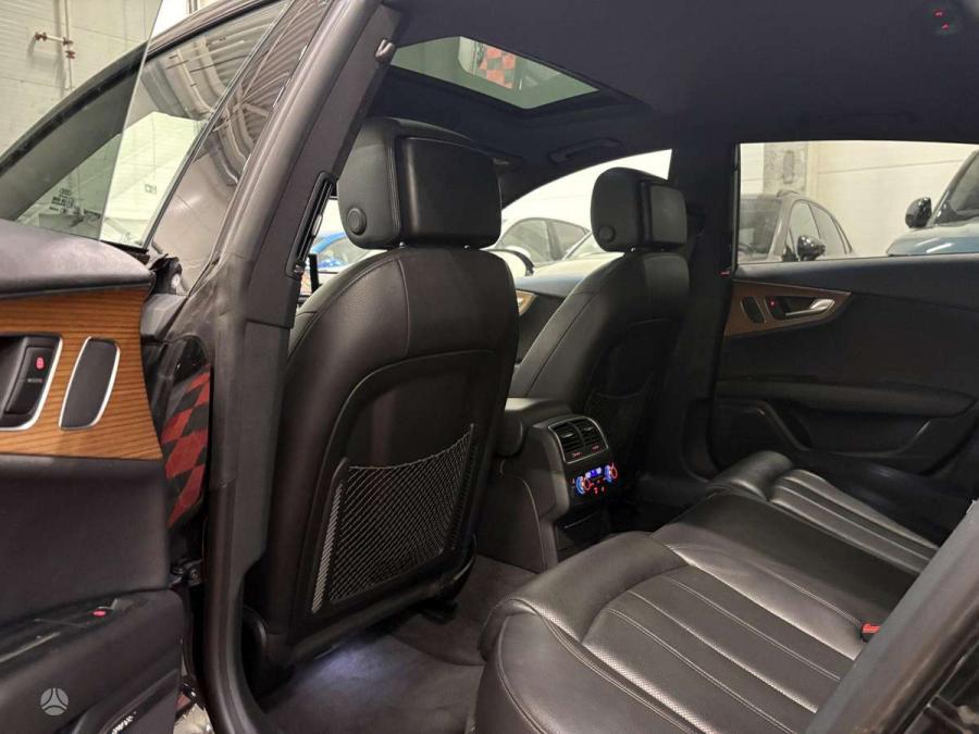 Black Audi A7 Sportback 2016 in Vilnius, with an engine capacity of 3.00 L and mileage of 201 thousand km for 18990 €, photo 31 on AUTOMOTO.COM.LV