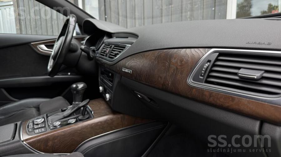 Melns Audi A7 Sportback 2012 Rīga, ar dzinēja tilpumu 3.00 L un nobraukumu 250 tūkst. km par 11500 €, foto 24 vietnē AUTOMOTO.COM.LV