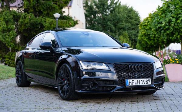 Black Audi A7 Sportback 2013 in Vilnius, with an engine capacity of 3.00 L and mileage of 241 thousand km for 16950 €, photo 4 on AUTOMOTO.COM.LV