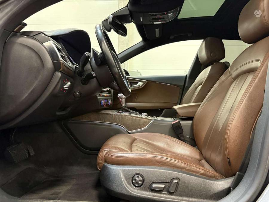 Black Audi A7 Sportback 2015 in Vilnius, with an engine capacity of 3.00 L and mileage of 192 thousand km for 11500 €, photo 33 on AUTOMOTO.COM.LV