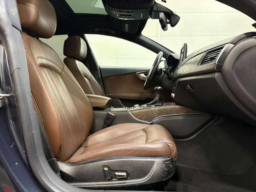Black Audi A7 Sportback 2015 in Vilnius, with an engine capacity of 3.00 L and mileage of 192 thousand km for 11500 €, photo 39 on AUTOMOTO.COM.LV