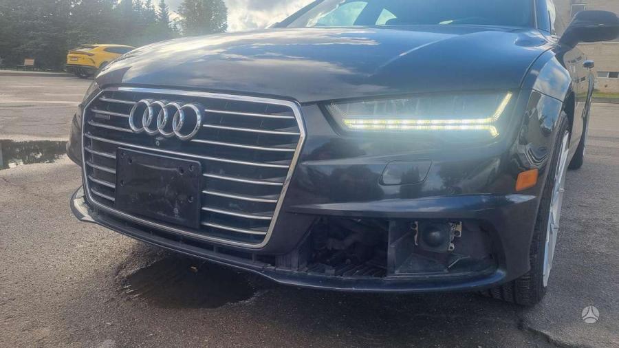 Blue Audi A7 Sportback 2016 in Siauliai, with an engine capacity of 3.00 L and mileage of 207 thousand km for 9250 €, photo 14 on AUTOMOTO.COM.LV