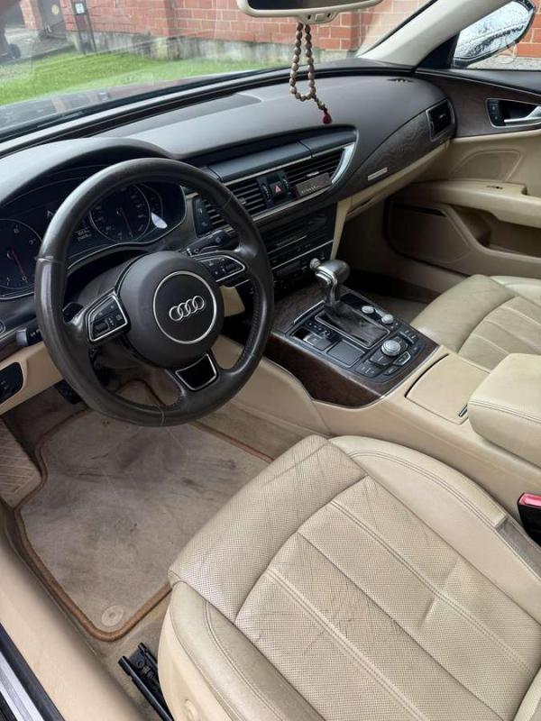 Blue Audi A7 Sportback 2014 in Klaipeda, with an engine capacity of 3.00 L and mileage of 214 thousand km for 7700 €, photo 8 on AUTOMOTO.COM.LV